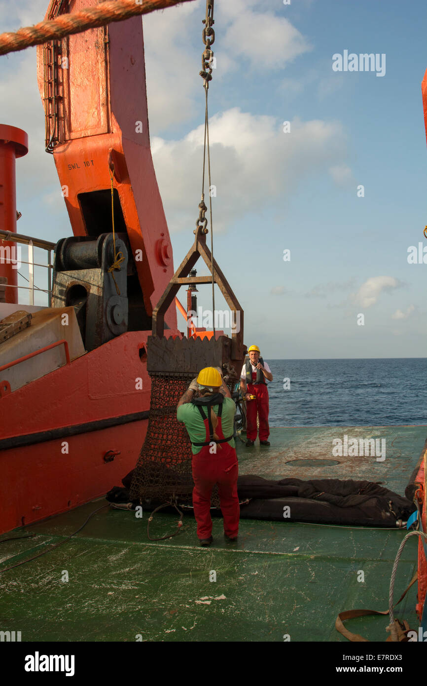 To pick up stones from deep submarine Walvis Ridge volcanoes the crew ...