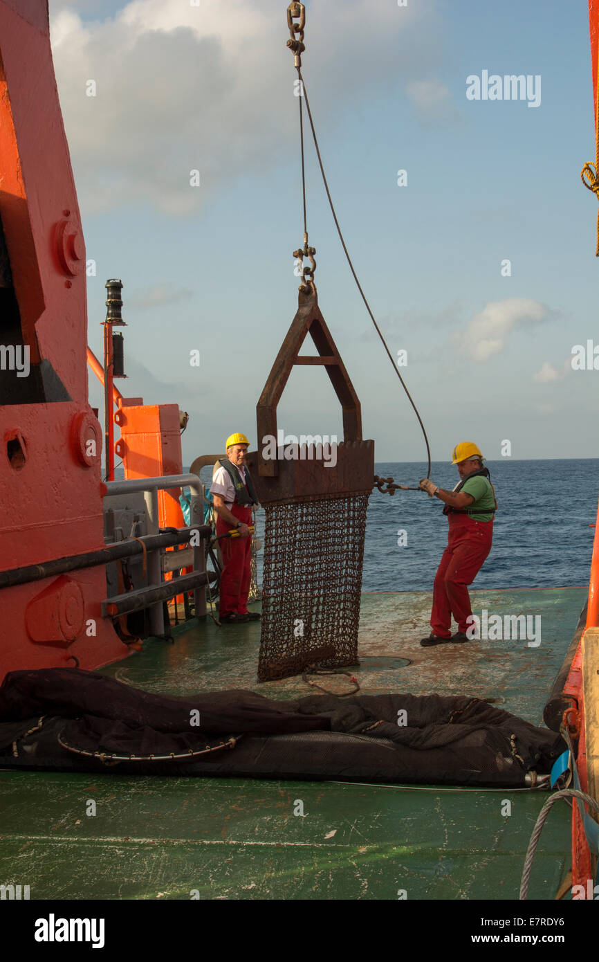 To pick up stones from deep submarine Walvis Ridge volcanoes the crew ...