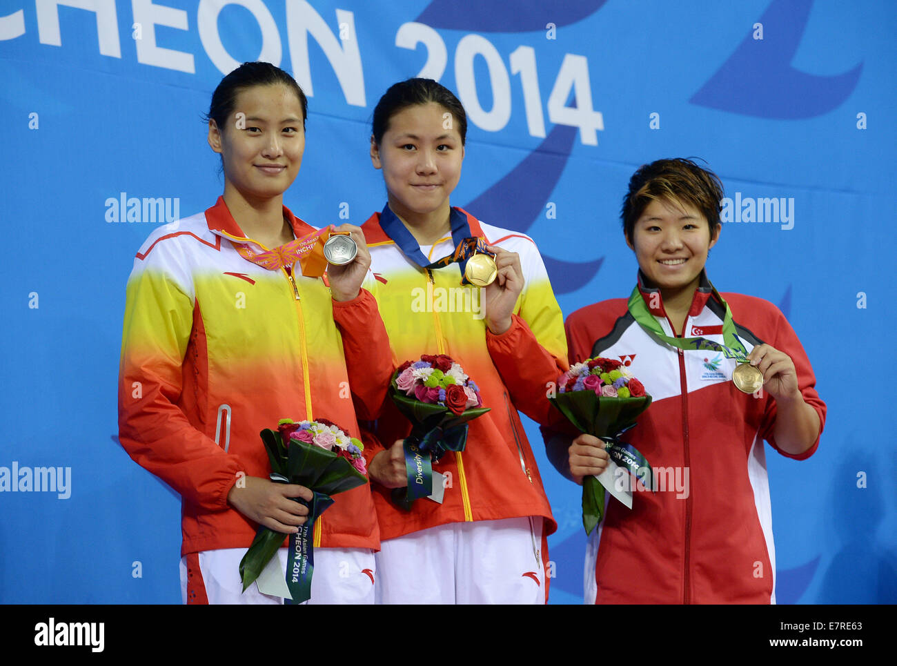 Incheon, South Korea. 23rd Sep, 2014. Gold medalist Chen Xinyi (C) of ...