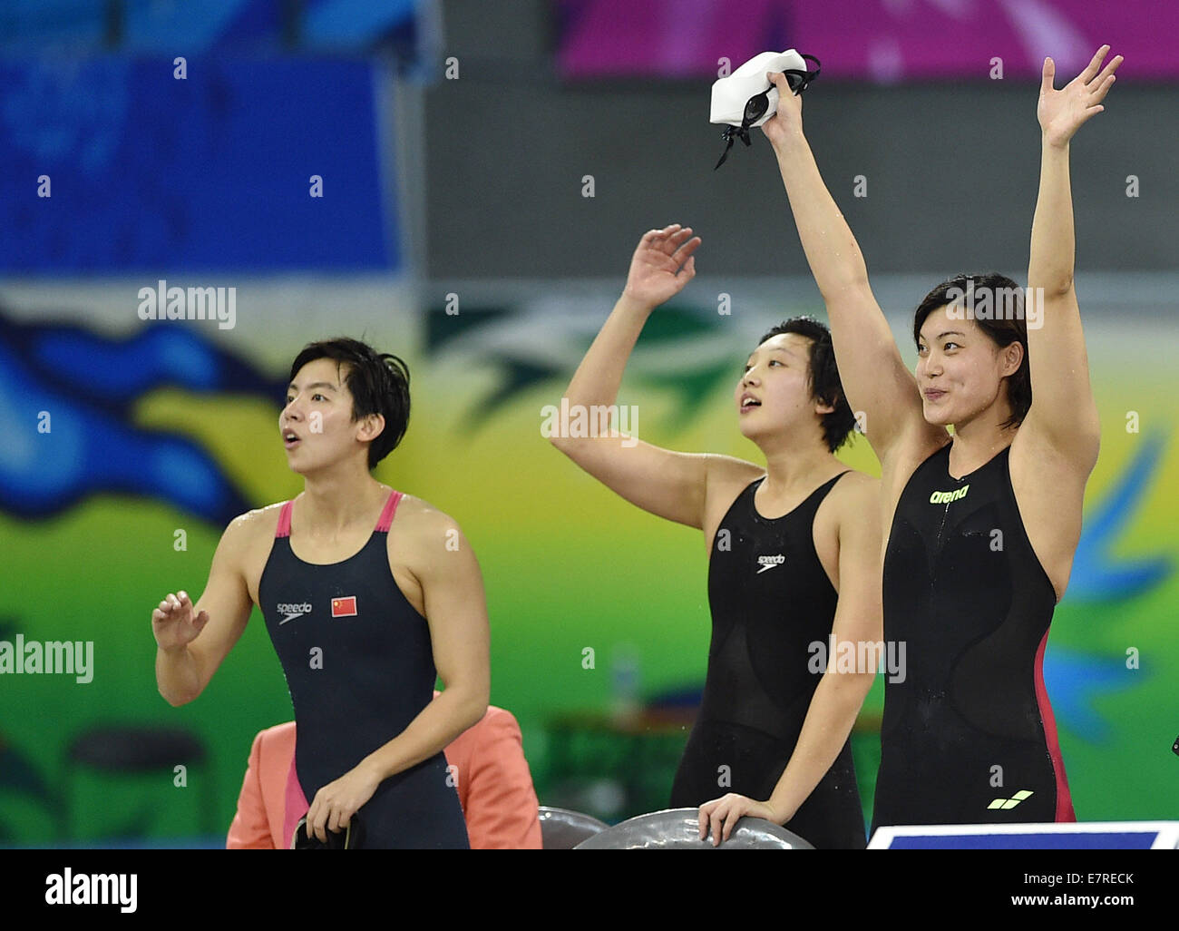 Incheon, South Korea. 23rd Sep, 2014. Chinese swimmers Guo Junjun, Cao Yue and Tang Yi (from L ...