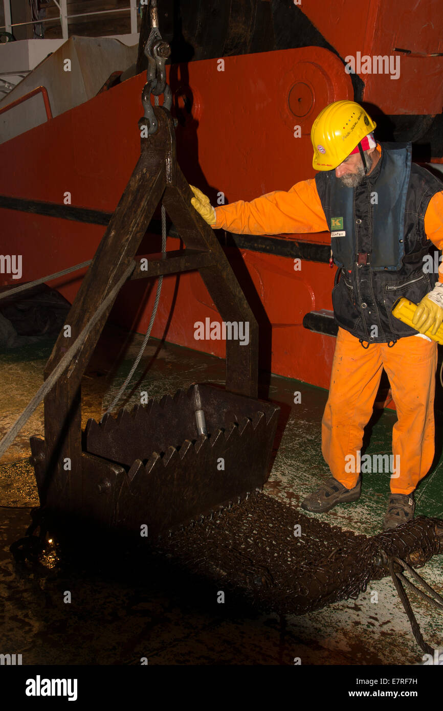 To pick up stones from deep submarine Walvis Ridge volcanoes the crew ...