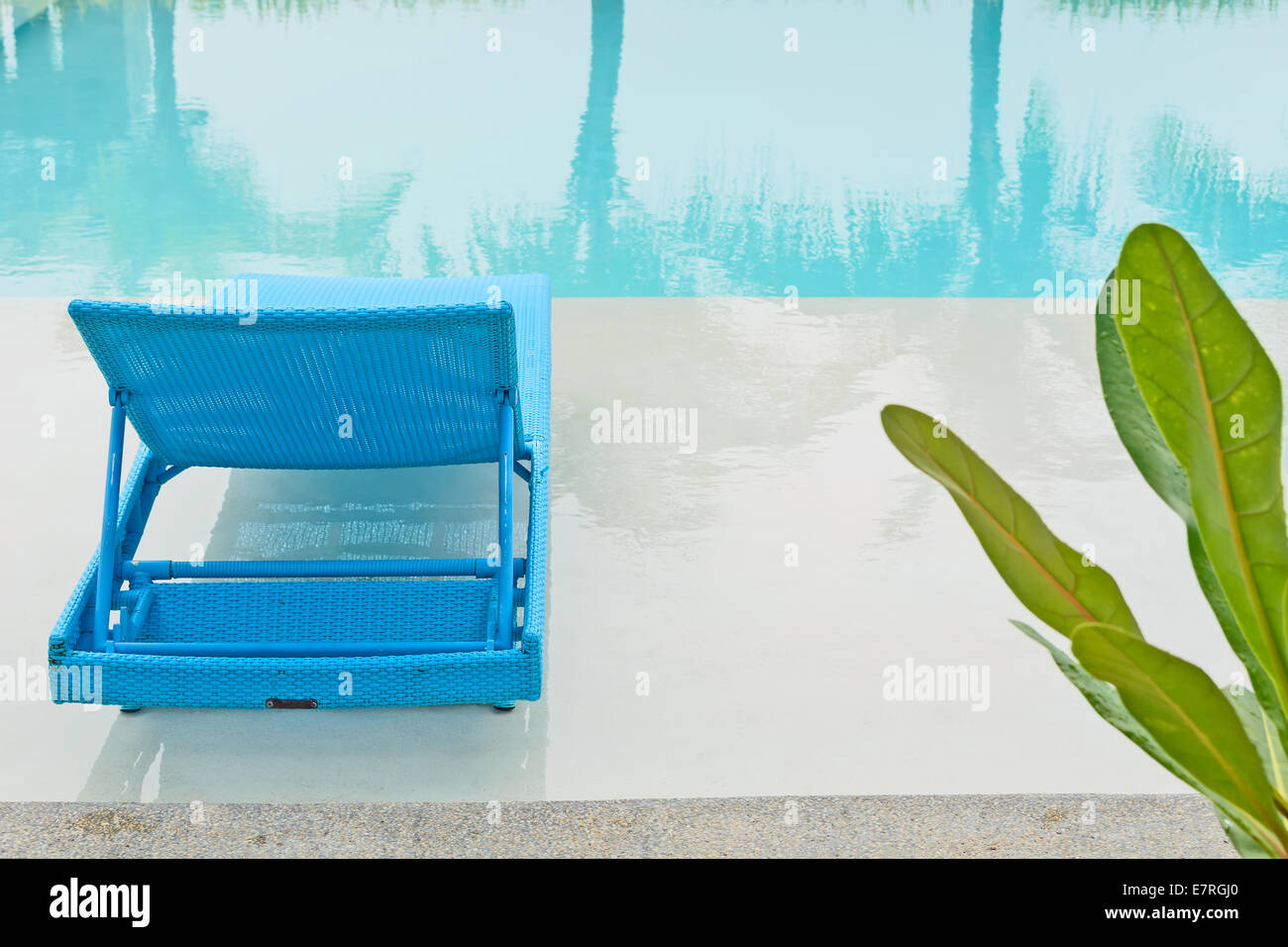 Turquoise pool bench in Philippine hotel Stock Photo - Alamy