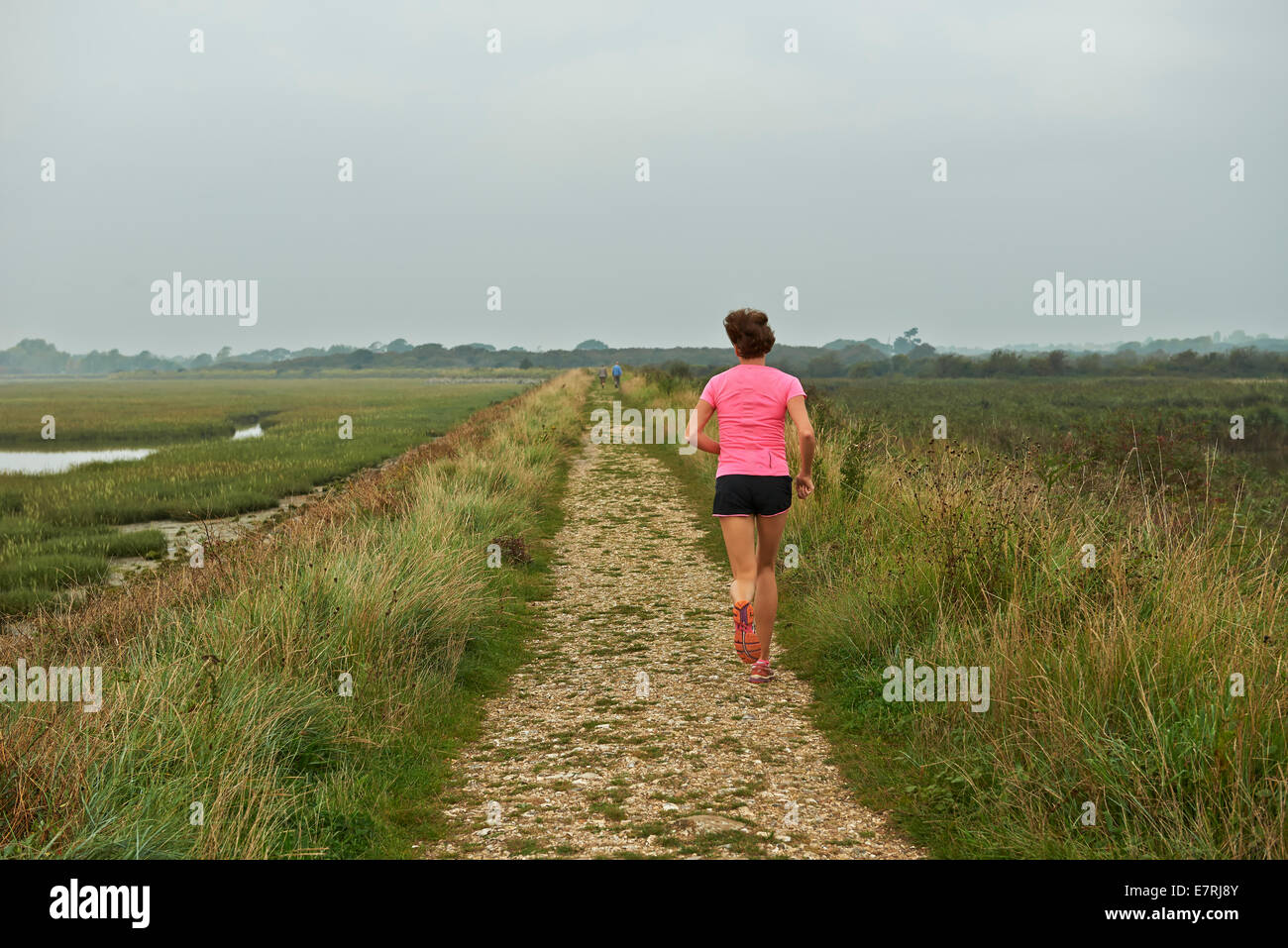 Black runner in countryside hi-res stock photography and images - Alamy