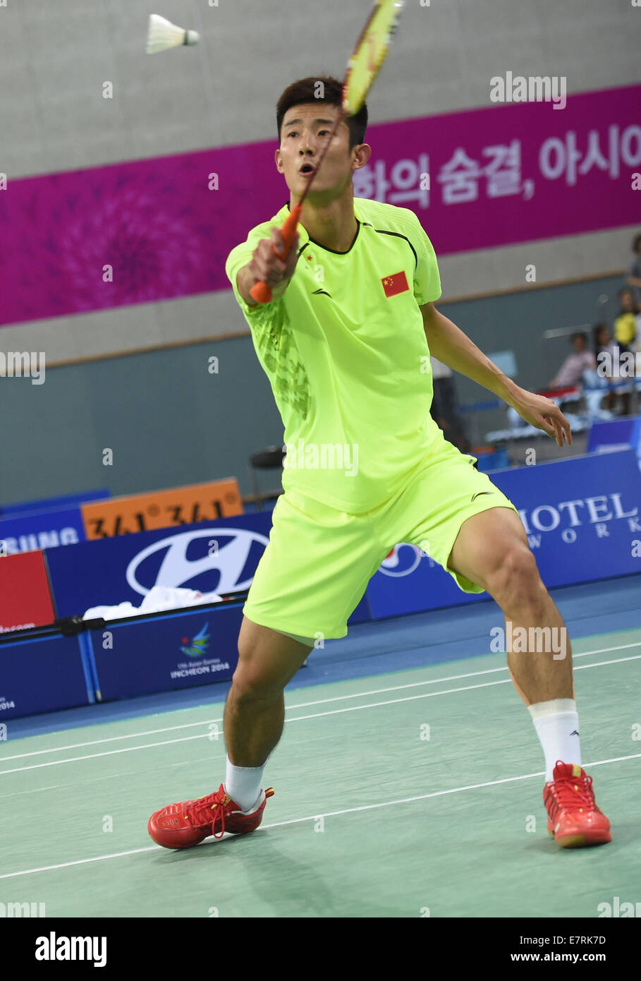 Incheon, South Korea. 23rd Sep, 2014. Chen Long of China returns the ...