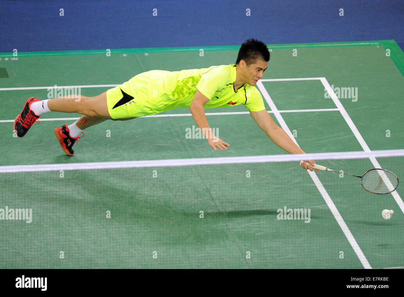 Incheon, South Korea. 23rd Sep, 2014. Fu Haifeng of China returns the ...