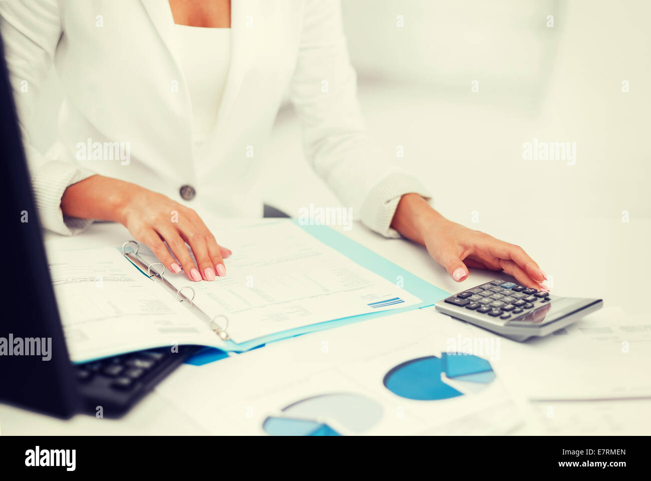 woman hand with calculator and papers Stock Photo - Alamy