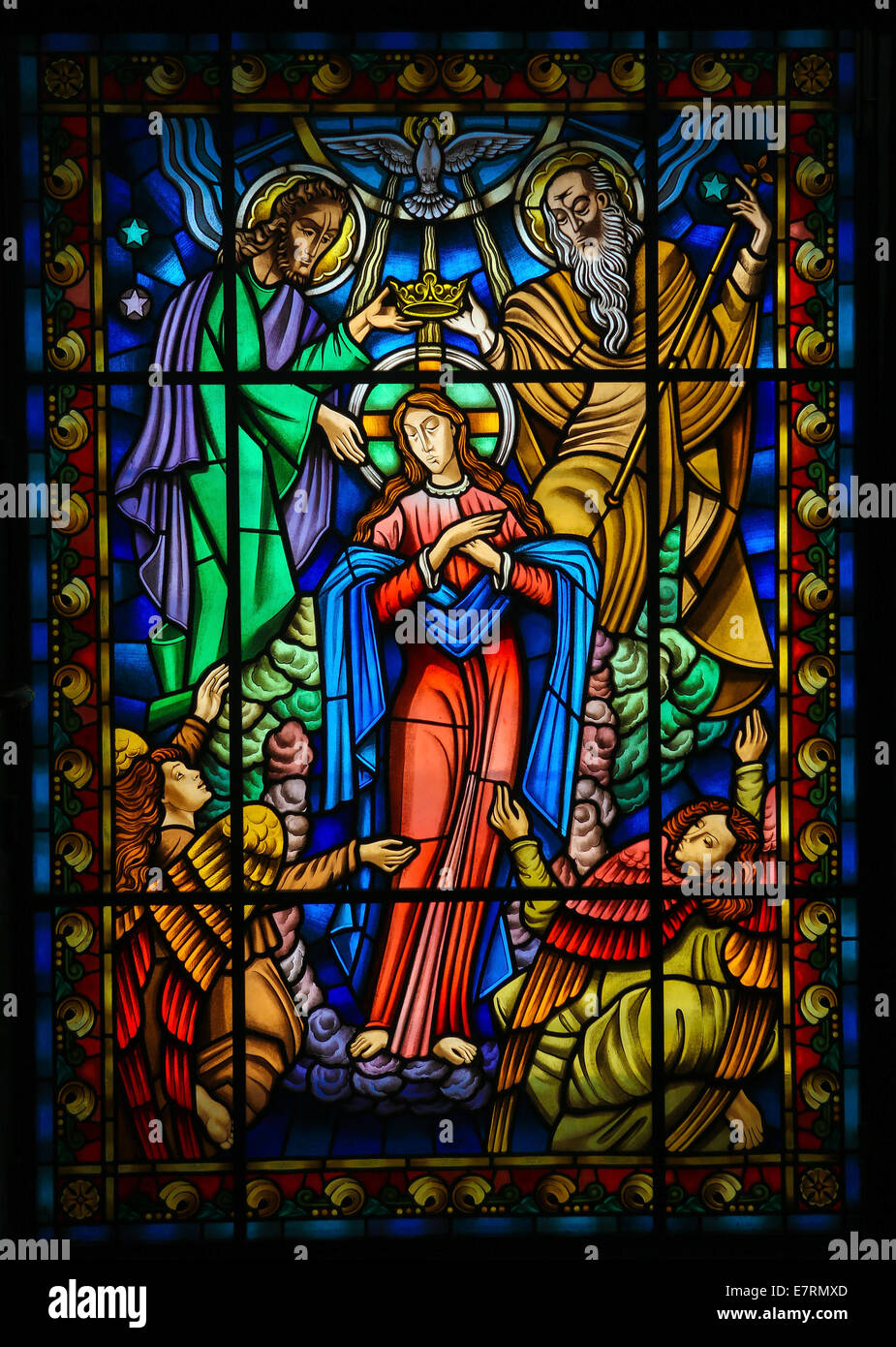 Stained glass window depicting Mother Mary and the Holy Trinity Stock ...