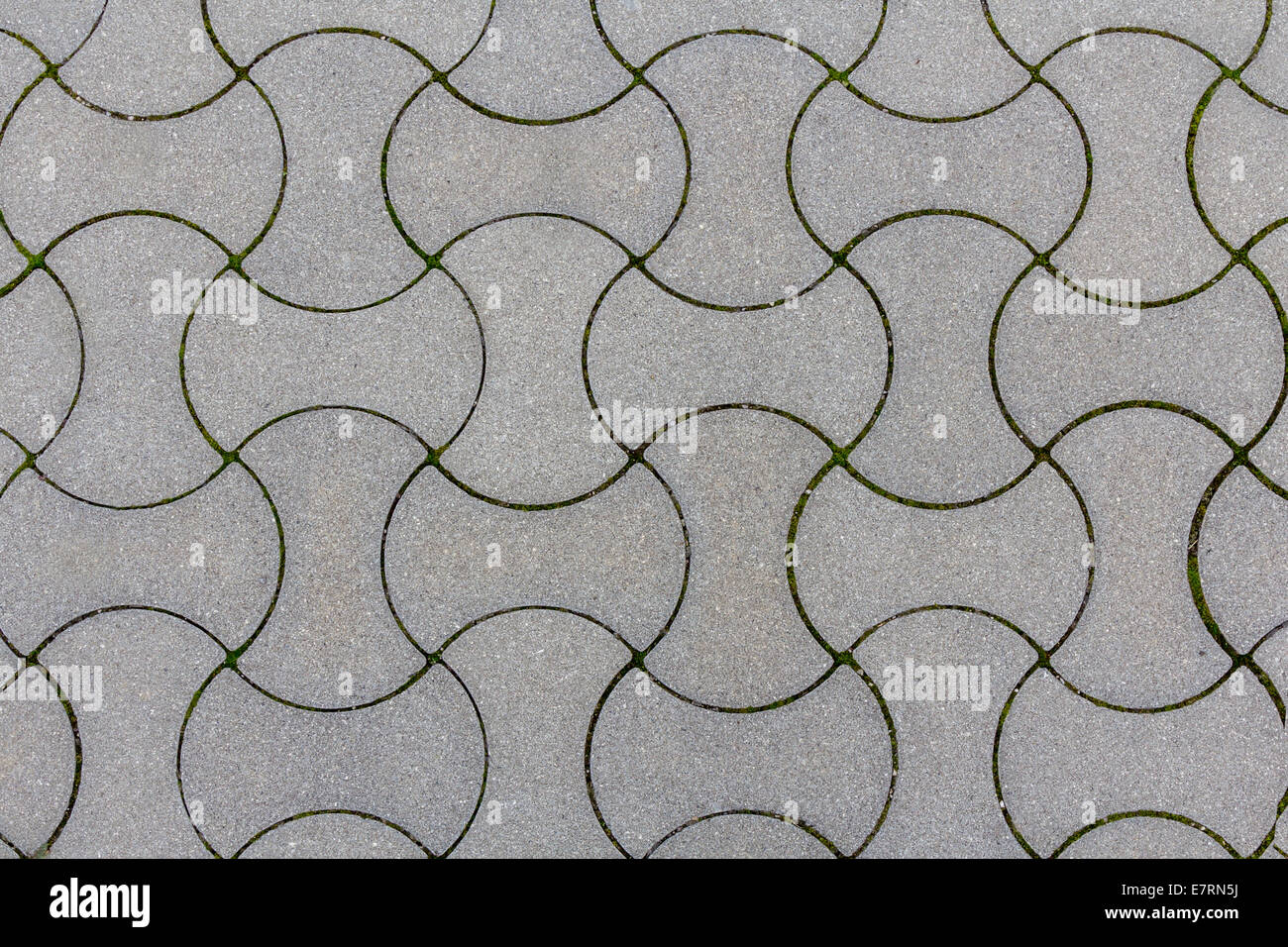 Modern Cobble pavement with double half moon shaped concrete stones ...