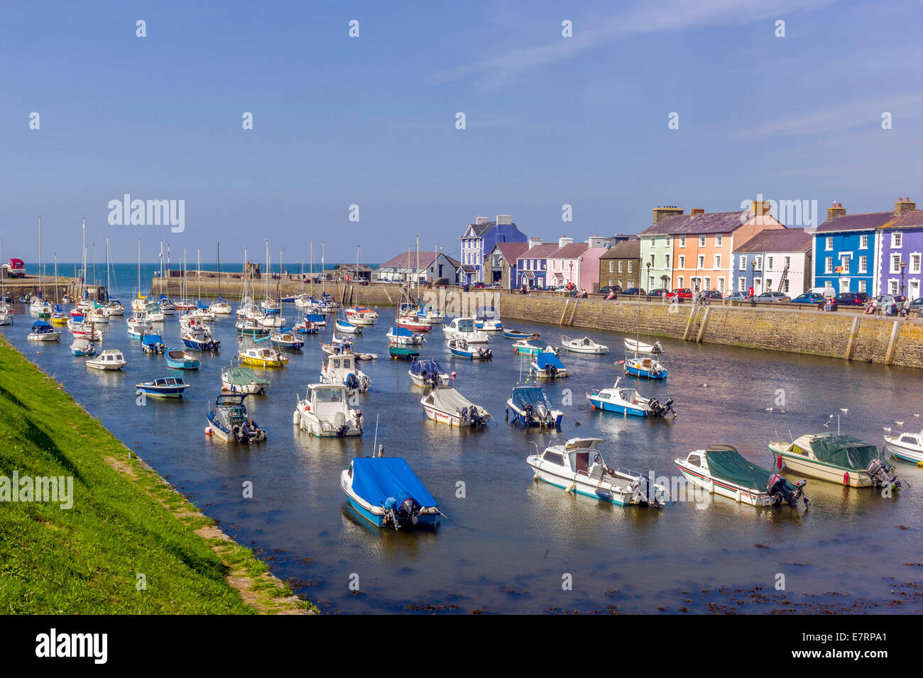 Aberaeron harbour surrounded by colourful regency styled houses and ...