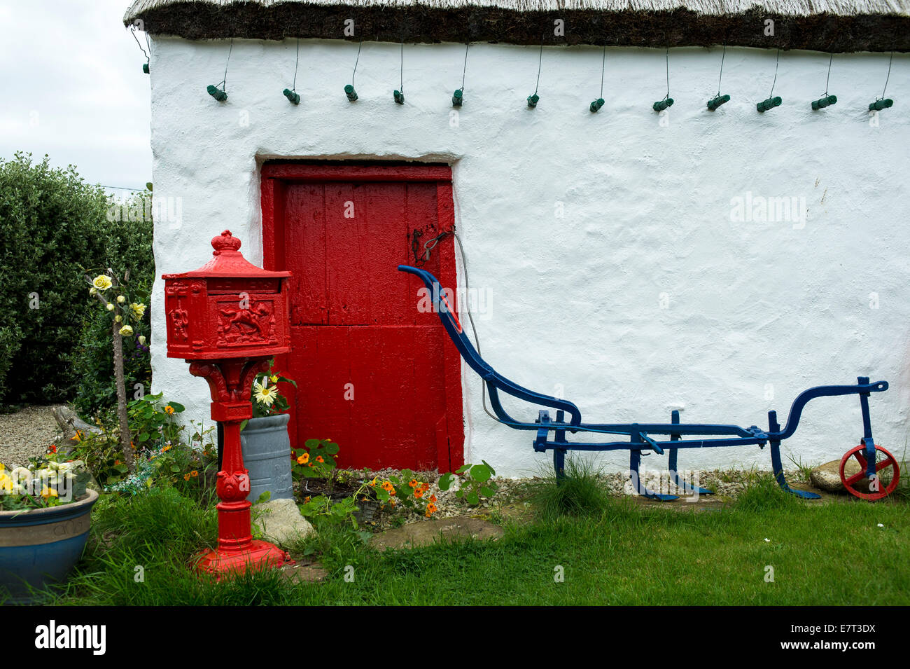 Victorian RED Pedestal letter Post Box outside a traditional 19th ...