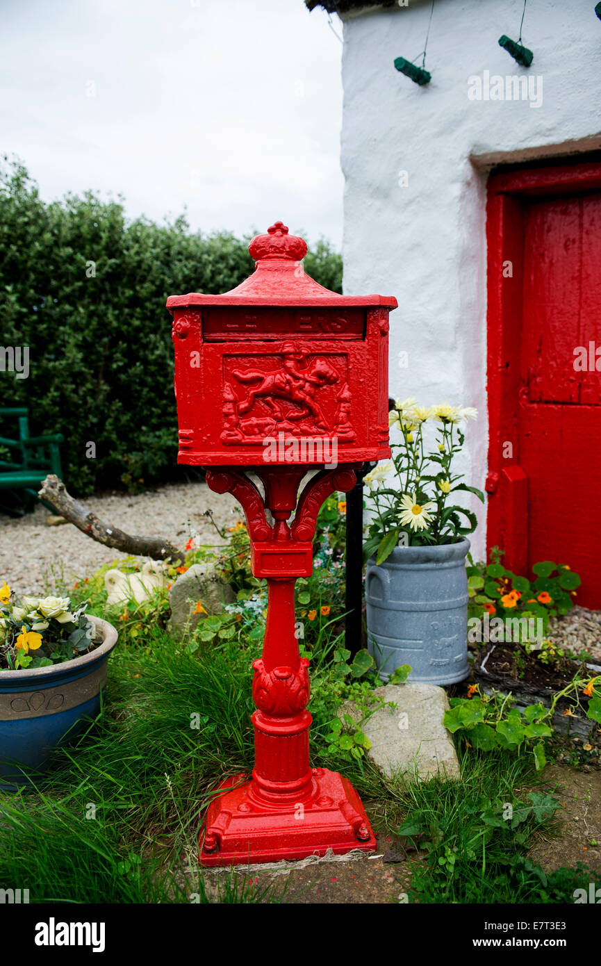 Victorian RED Pedestal letter Post Box outside a traditional 19th ...