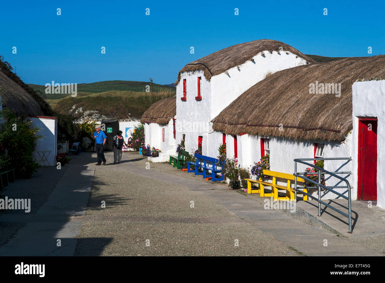 Traditional thatch roof 19th century Irish cottages at the Famine ...