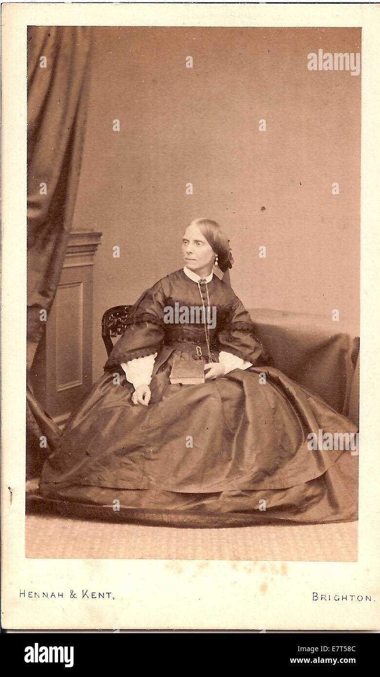A portrait of Mrs. James Bell Ewart, showcasing a woman in early 20th ...