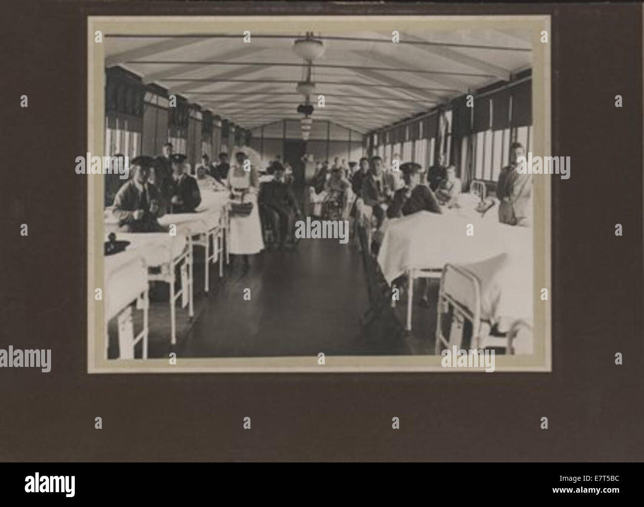 This photograph shows a hospital ward, likely from the early to mid ...