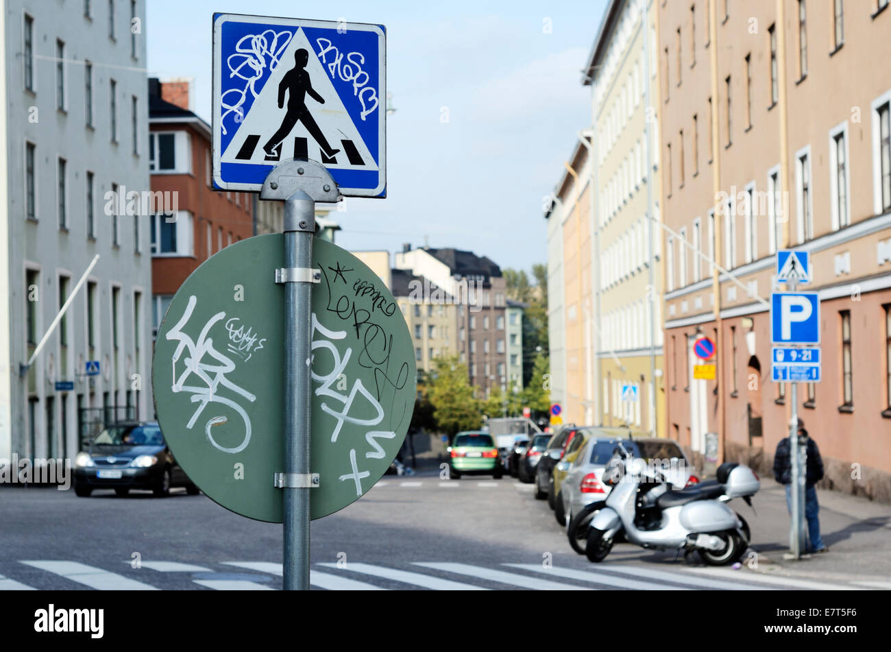 road signs with graffiti at a crossroads in Helsinki Stock Photo - Alamy