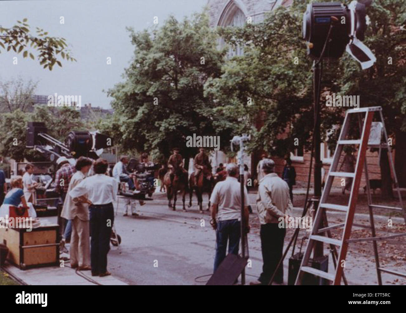 This image shows a film crew working on Cross Street, with cameras and ...