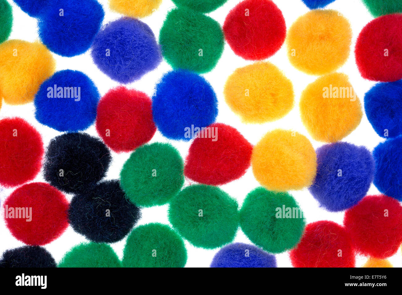 Several colorful craft pompoms against a white background Stock Photo ...