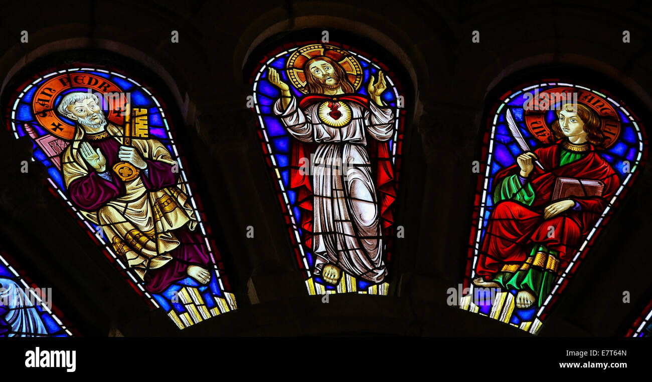 Stained glass window depicting Saint Peter, Jesus Christ and Saint John ...