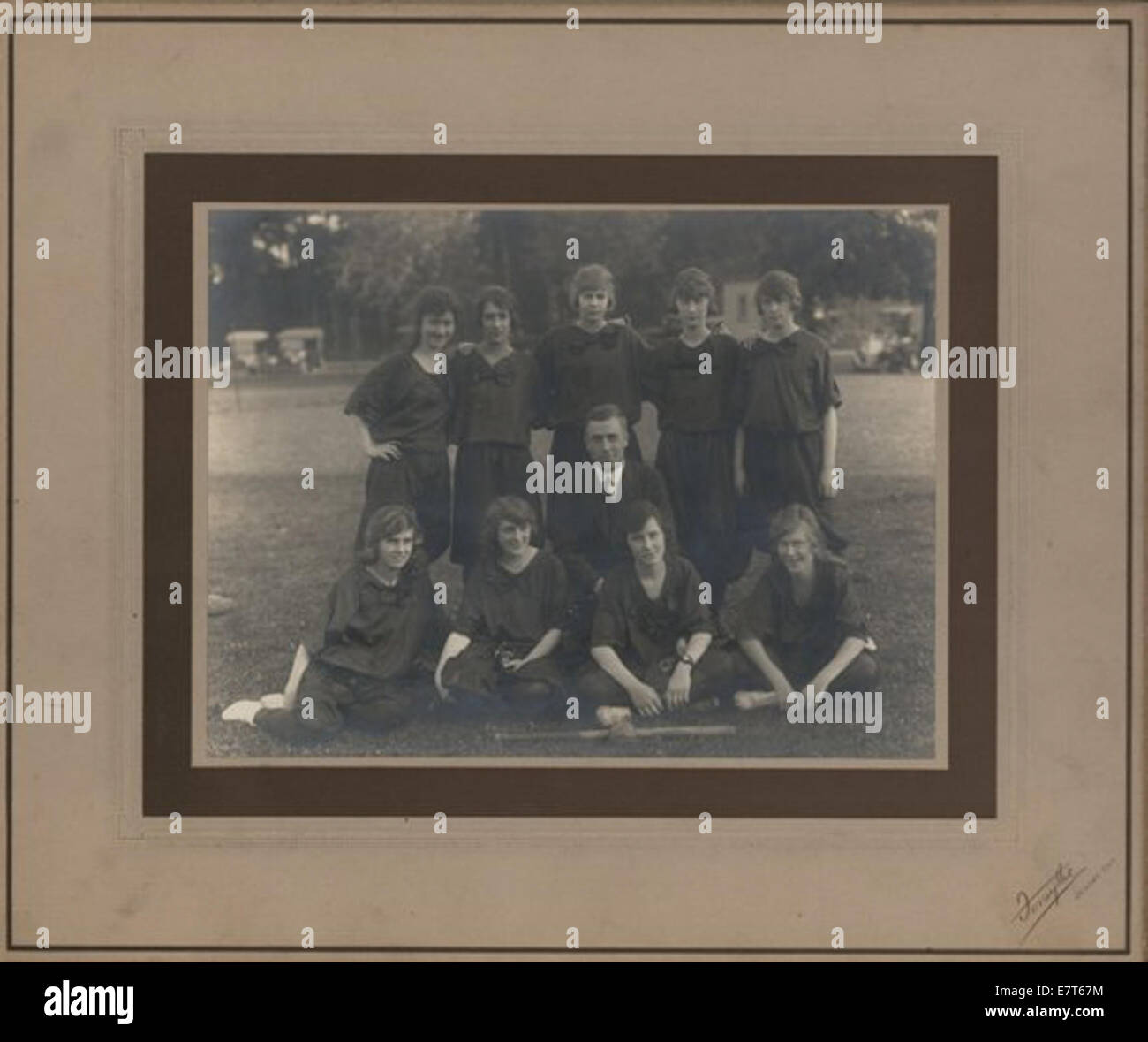Photograph of a girls' baseball team, capturing the group in uniform on ...