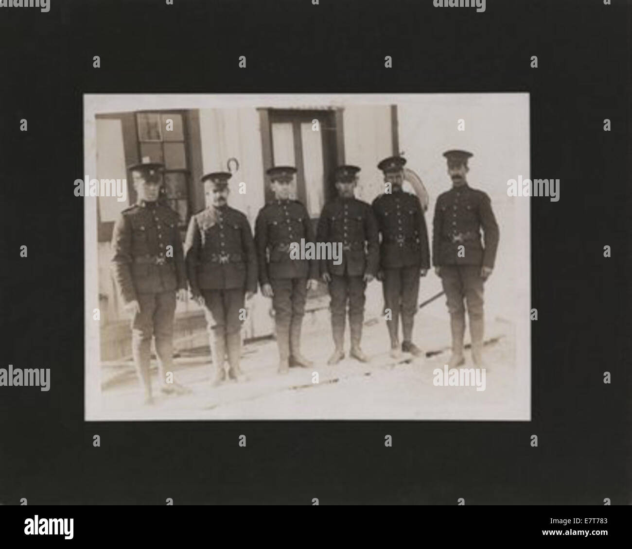 A photograph depicting six soldiers standing together, likely from the ...