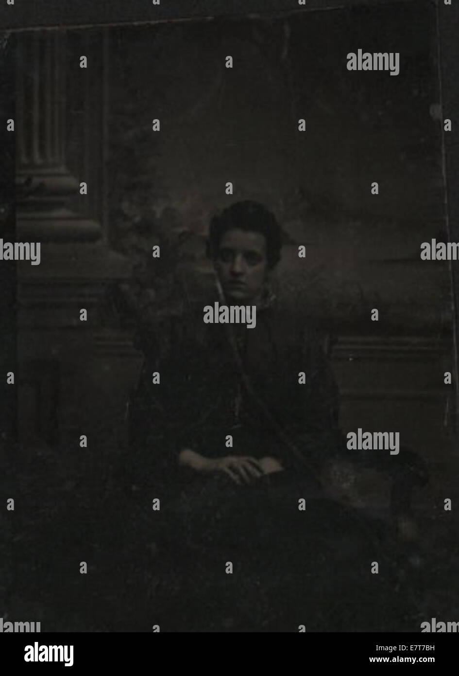 A photograph of an unidentified woman, captured in a vintage portrait ...