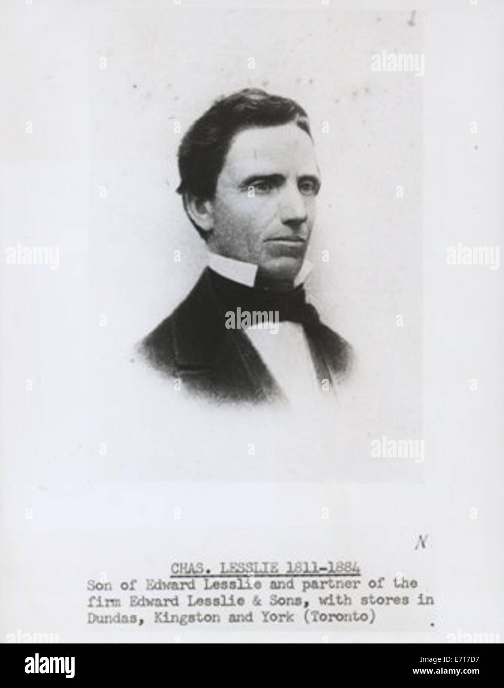 This portrait photograph features Charles Lesslie, captured in a ...