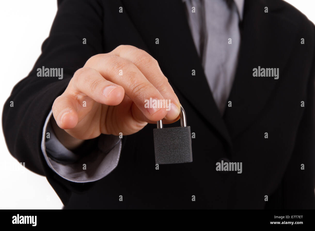 Business woman gives lock, isolated on white Stock Photo - Alamy
