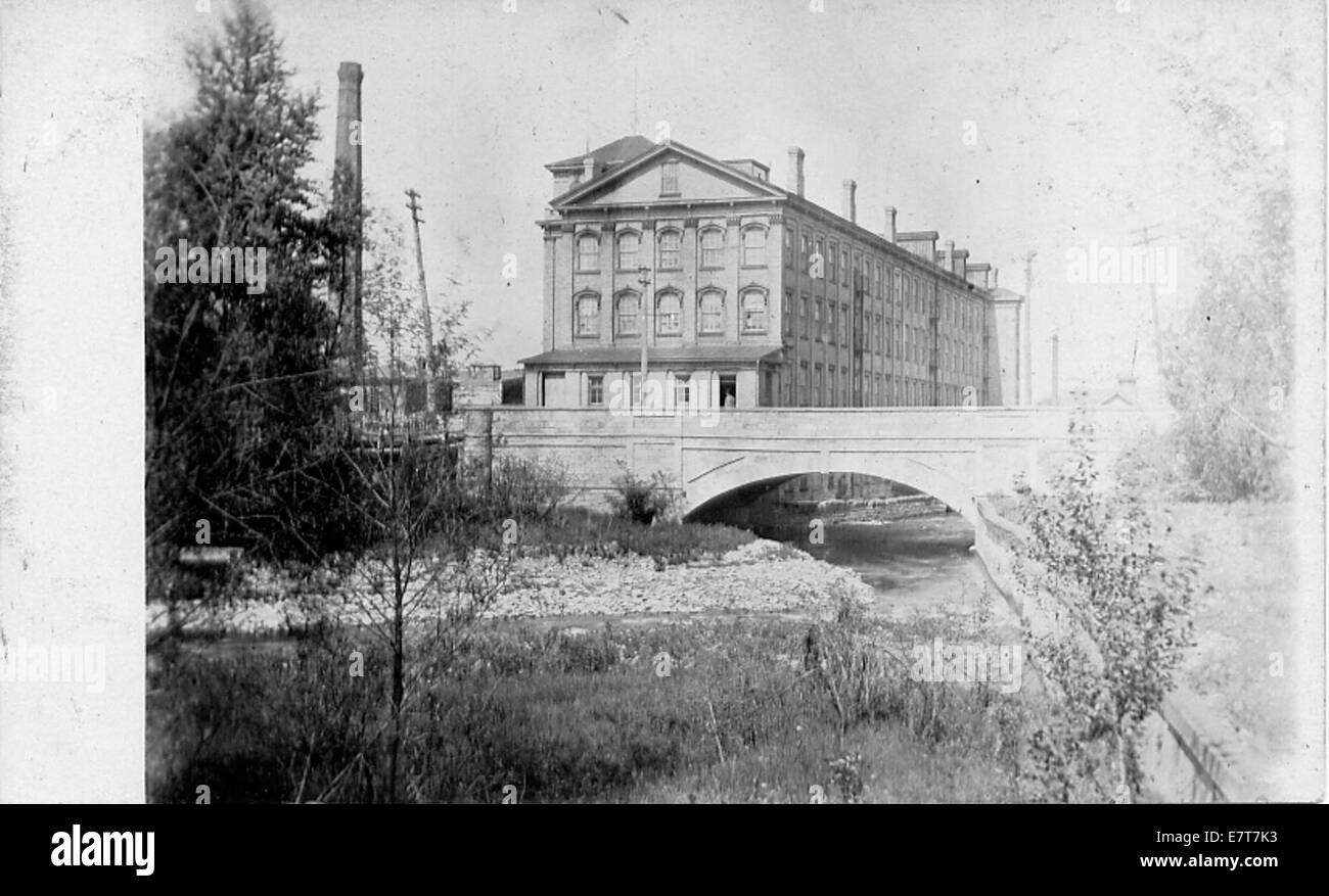 This photograph shows a cotton mill, highlighting the industrial ...