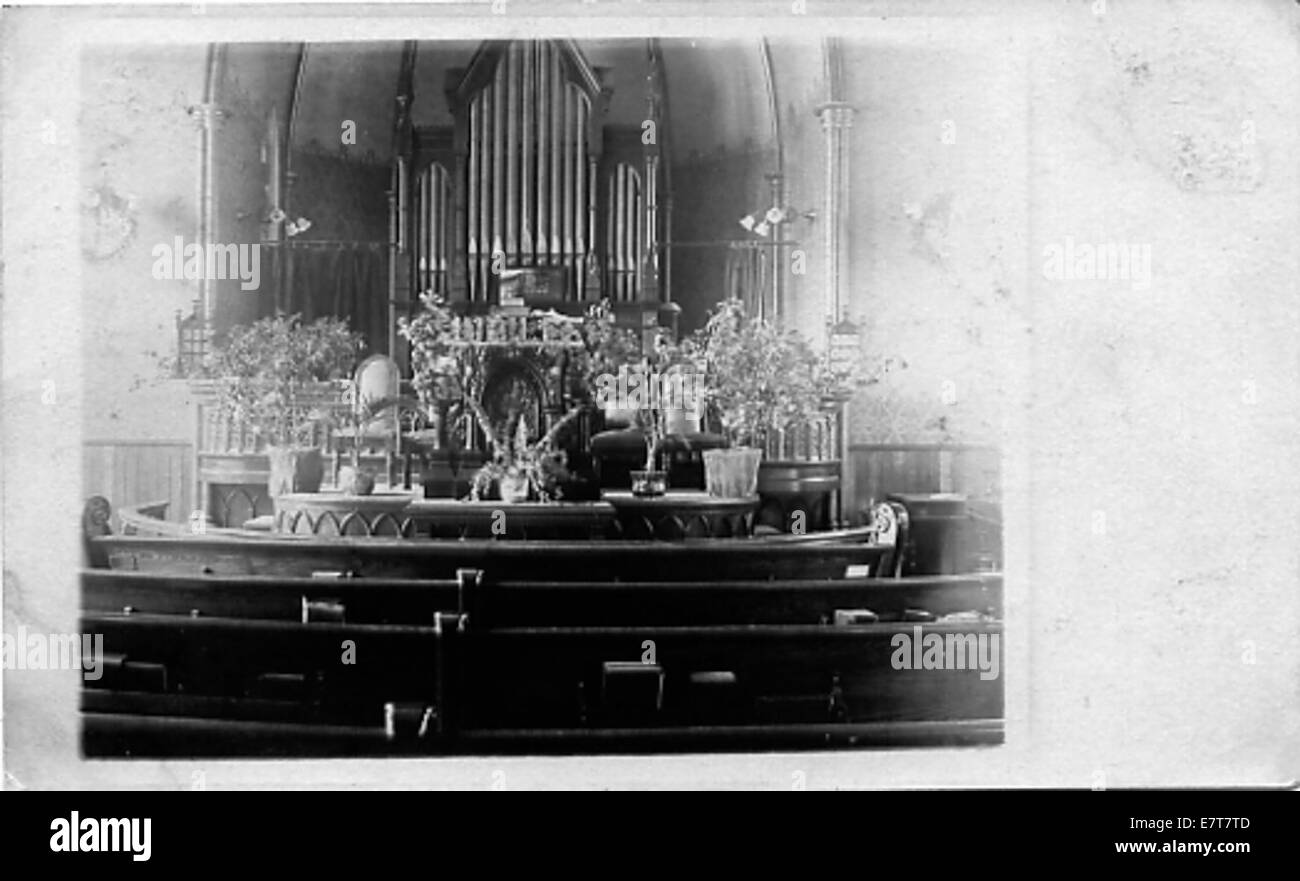 This photograph depicts a Methodist church, captured in a historical ...