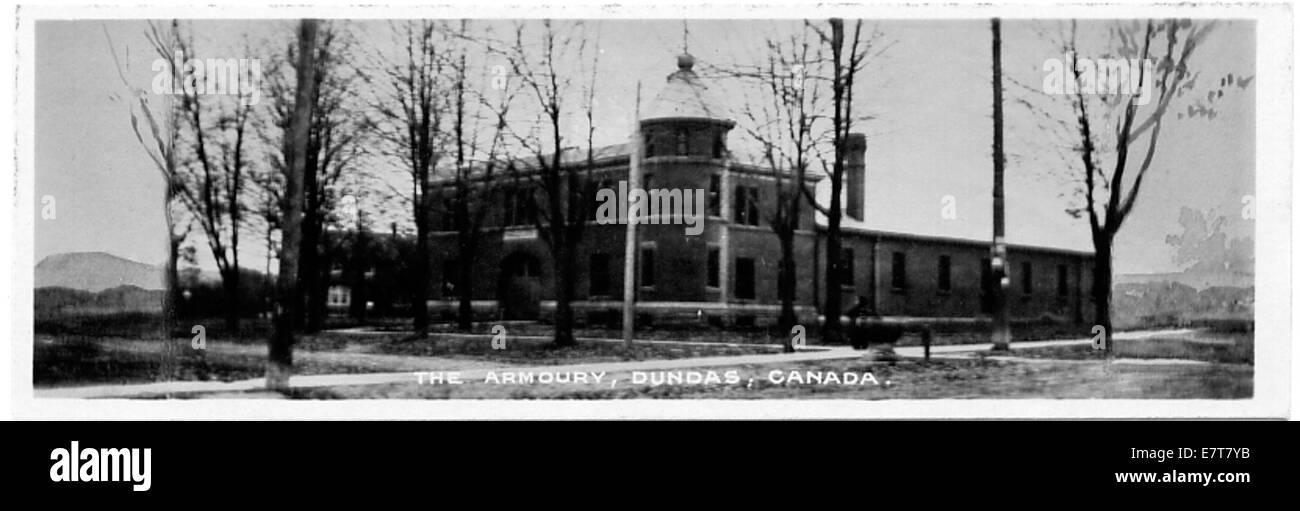 This photograph depicts an armory, likely a military facility, showing ...