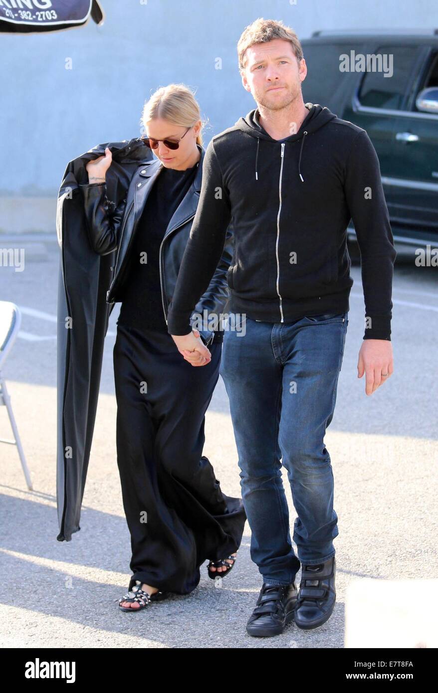 Sam Worthington and his partner, Laura Bingle exit Maxfield after a ...