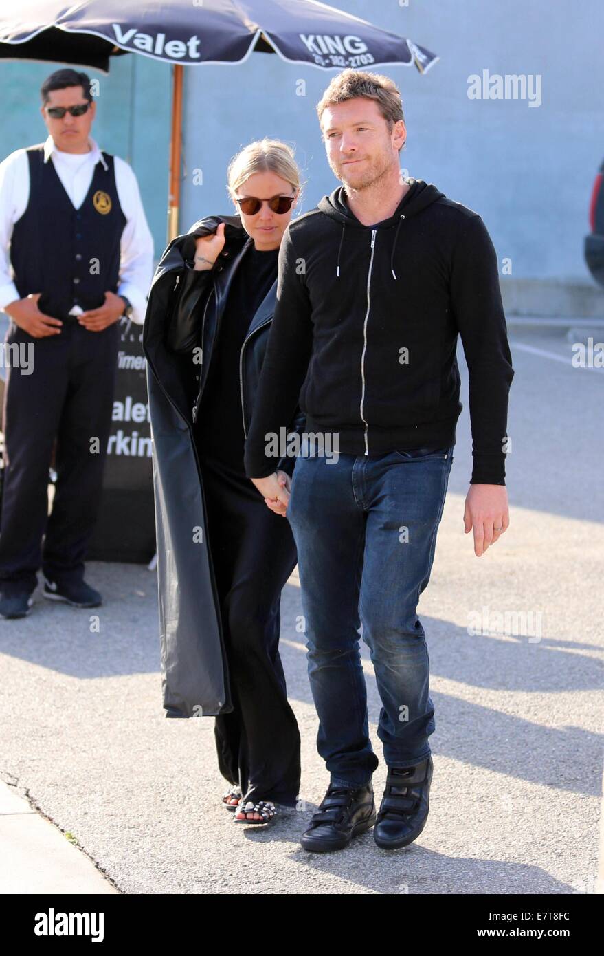 Sam Worthington and his partner, Laura Bingle exit Maxfield after a ...