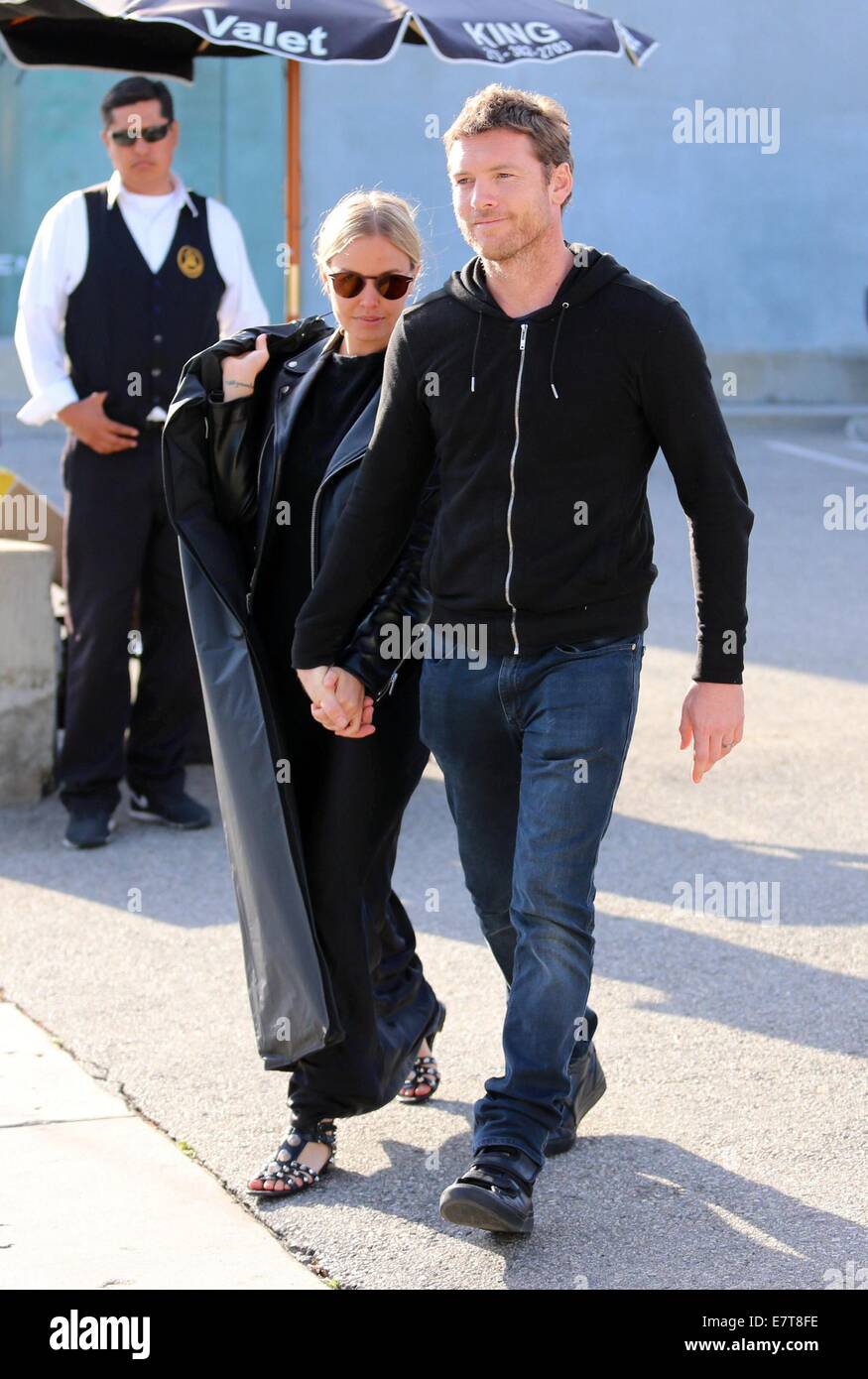 Sam Worthington and his partner, Laura Bingle exit Maxfield after a ...