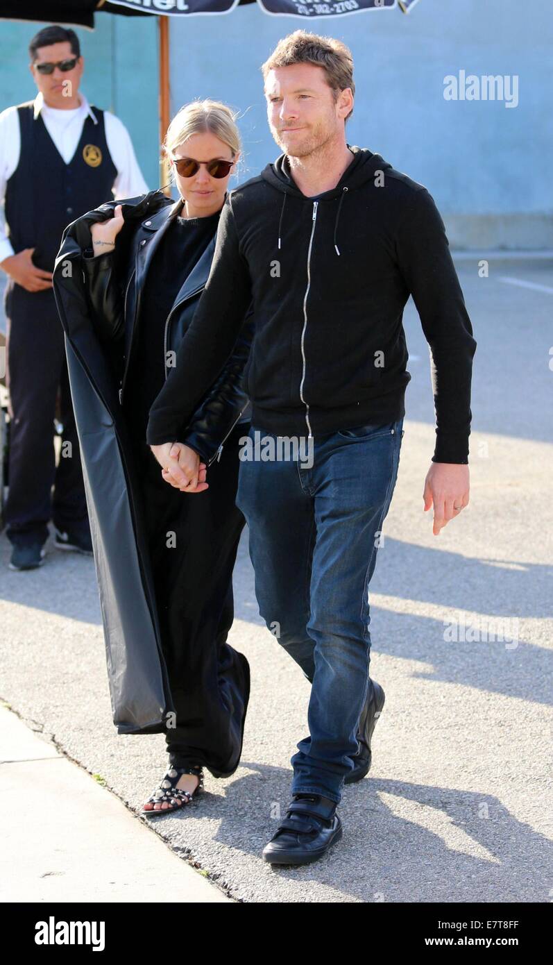 Sam Worthington and his partner, Laura Bingle exit Maxfield after a ...