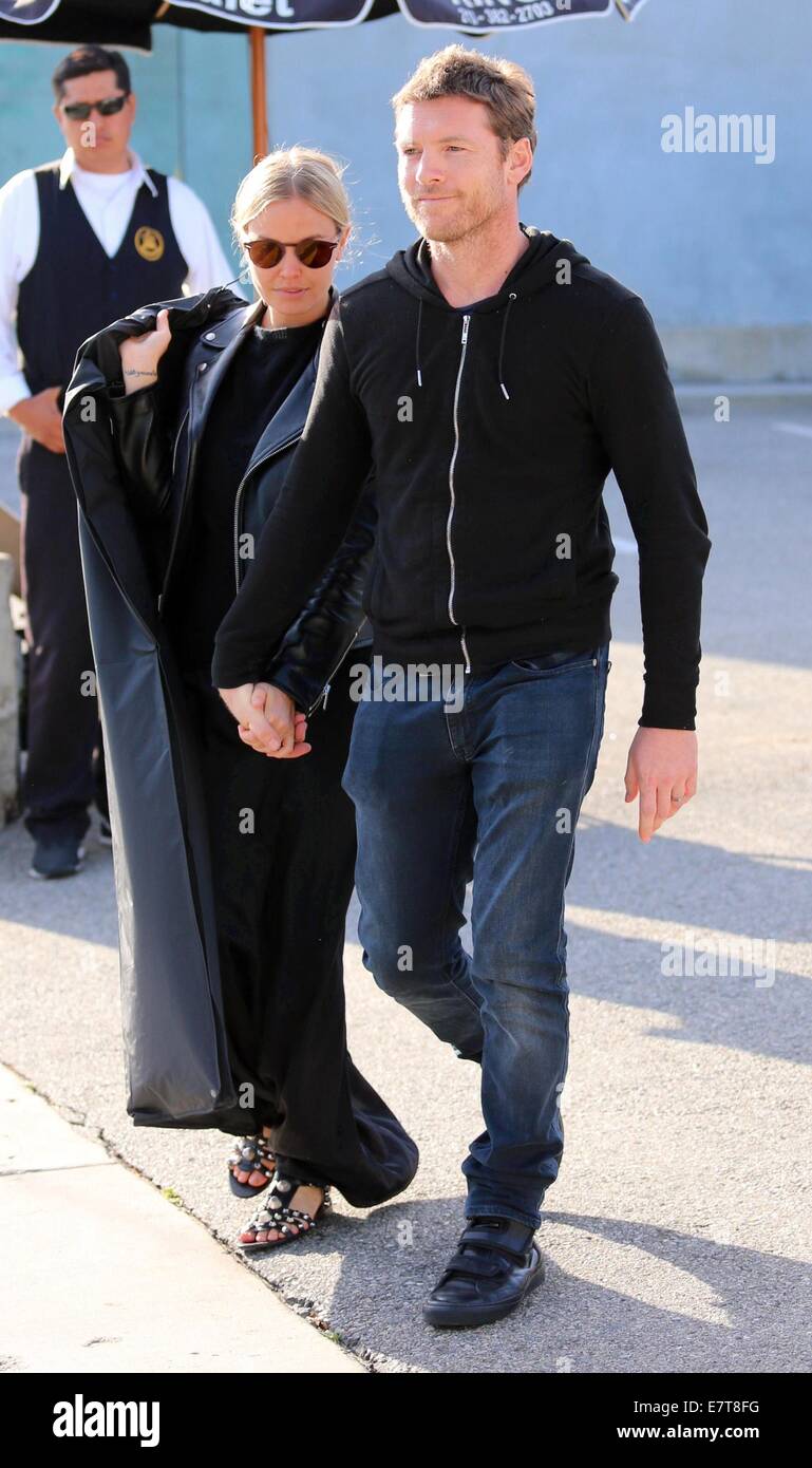 Sam Worthington and his partner, Laura Bingle exit Maxfield after a ...