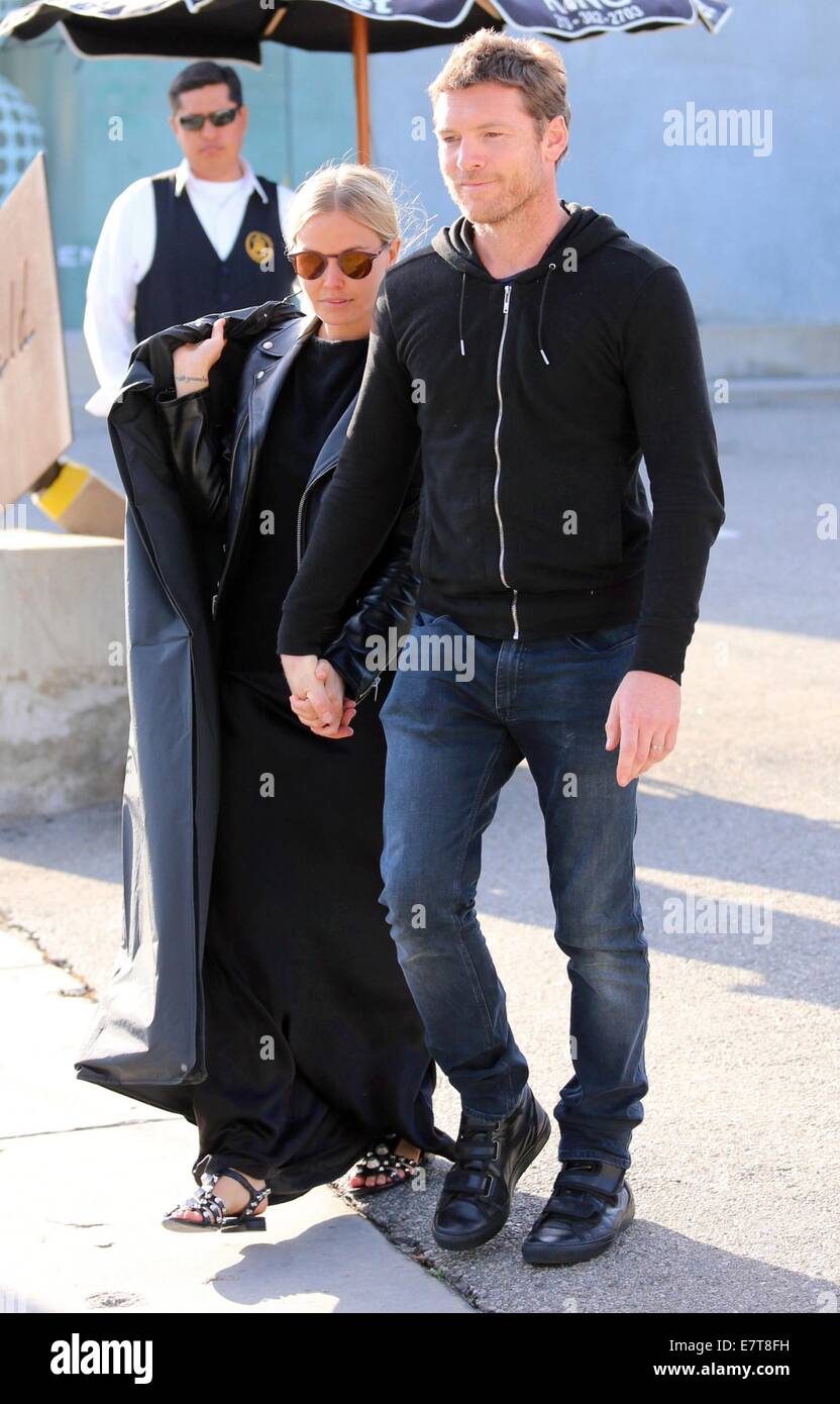 Sam Worthington and his partner, Laura Bingle exit Maxfield after a ...