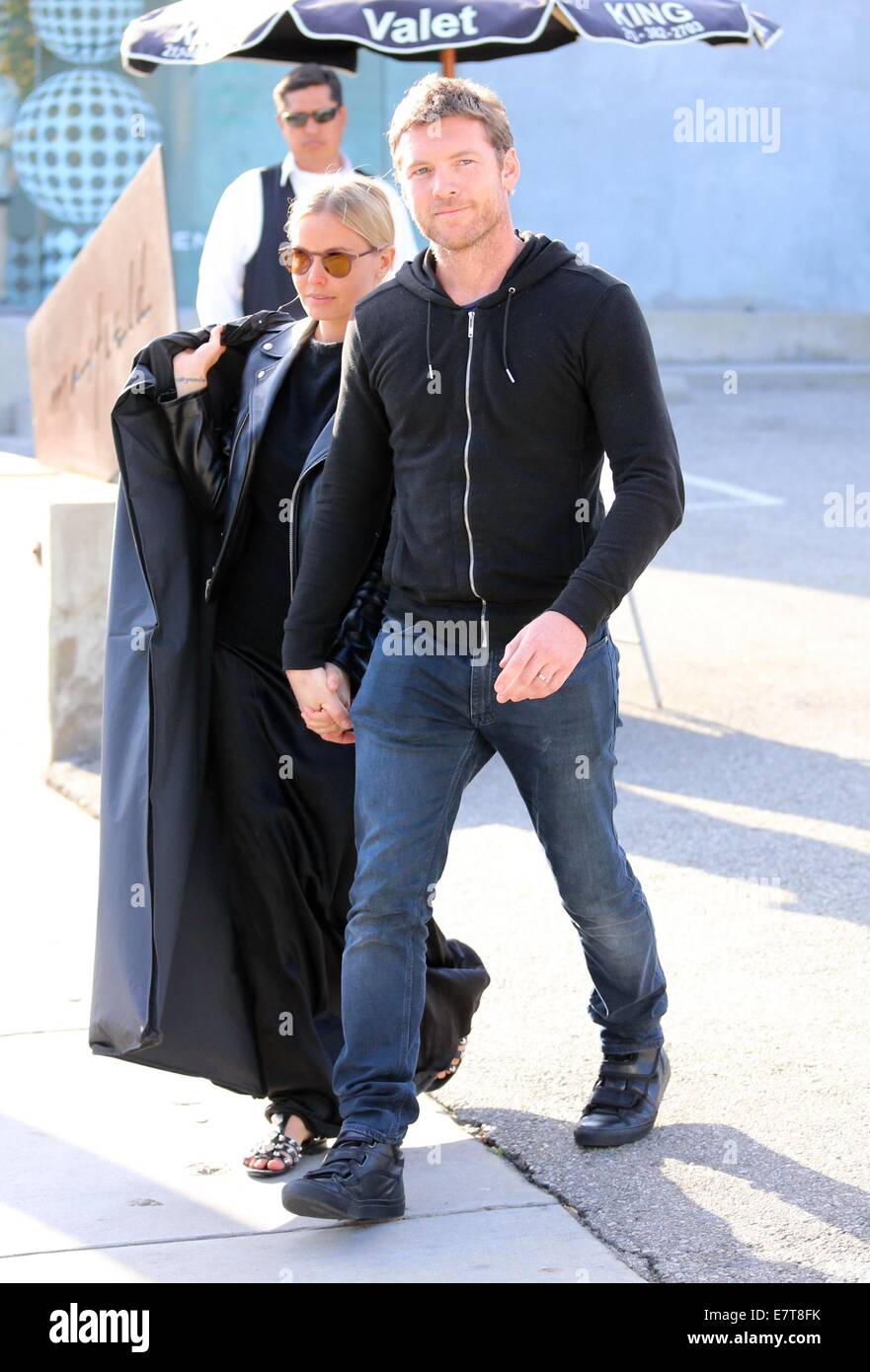 Sam Worthington and his partner, Laura Bingle exit Maxfield after a ...