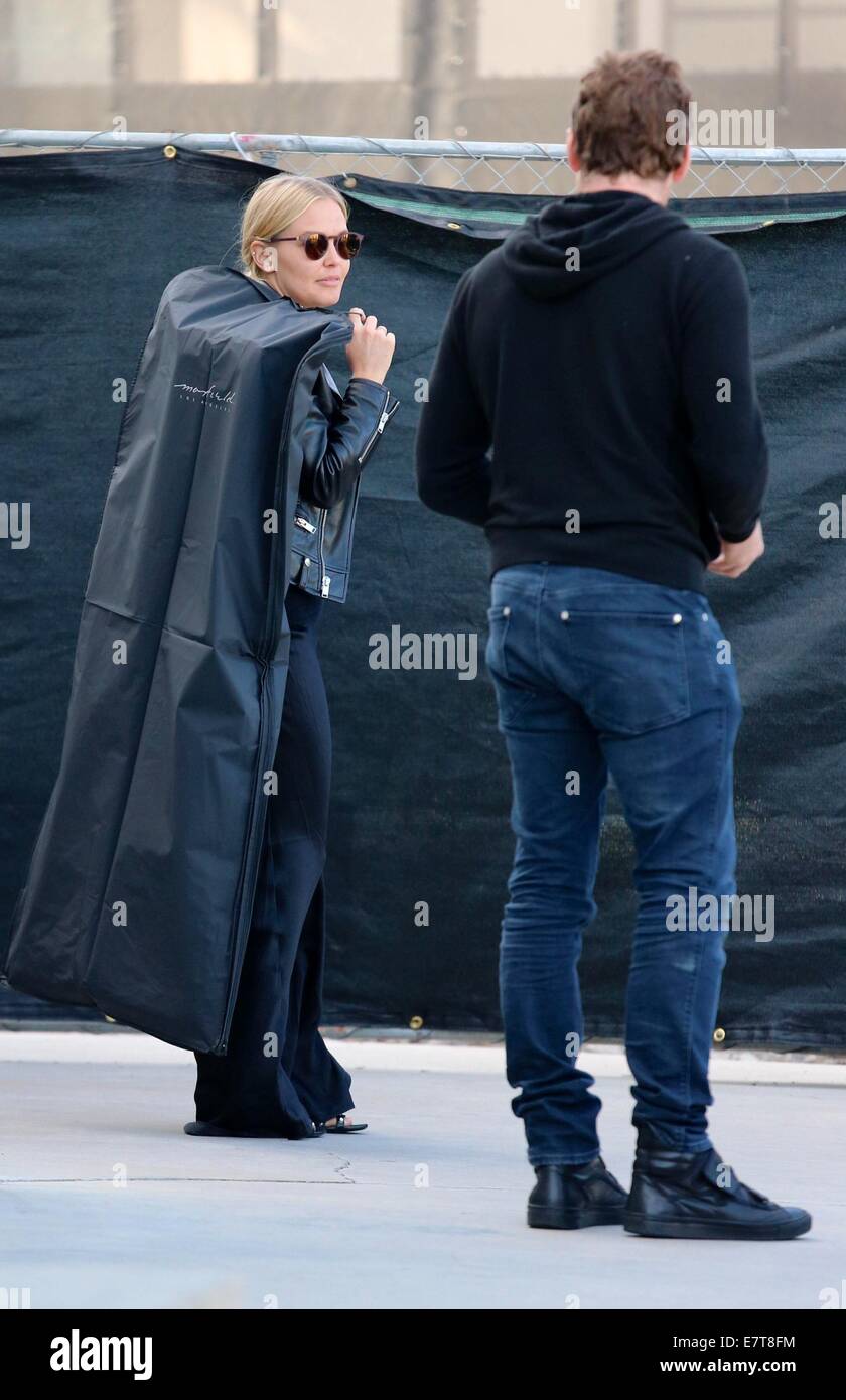 Sam Worthington and his partner, Laura Bingle exit Maxfield after a ...