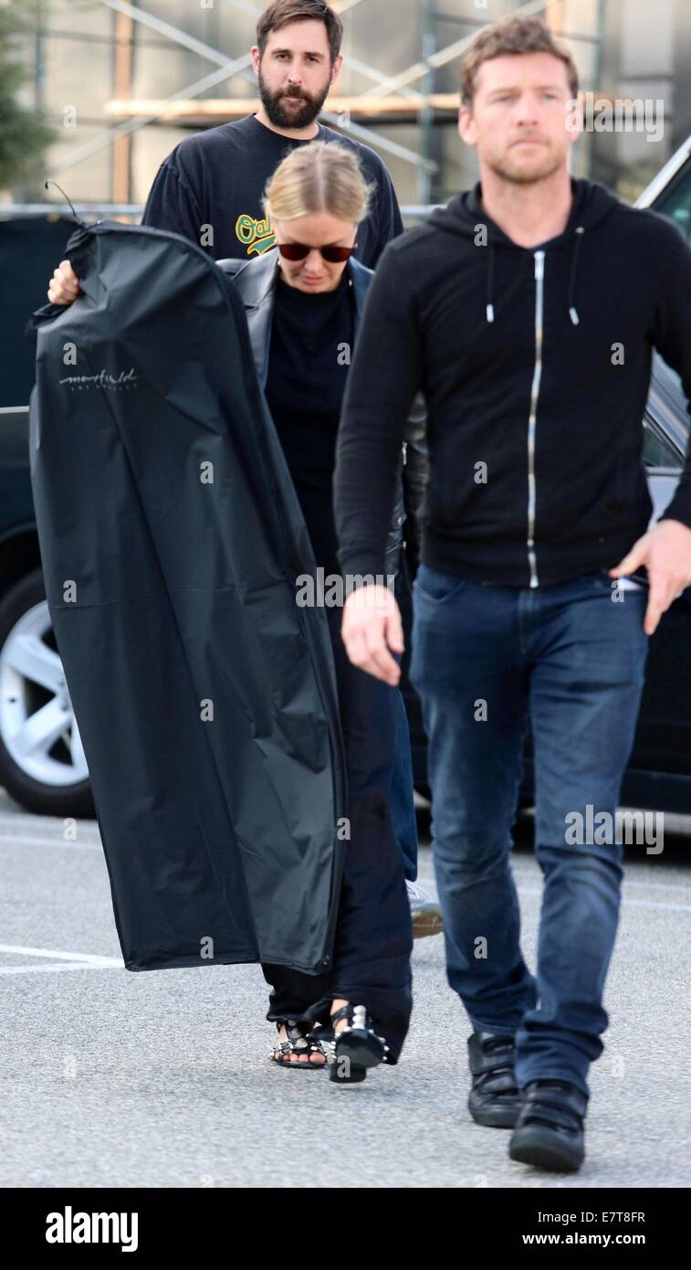 Sam Worthington and his partner, Laura Bingle exit Maxfield after a ...