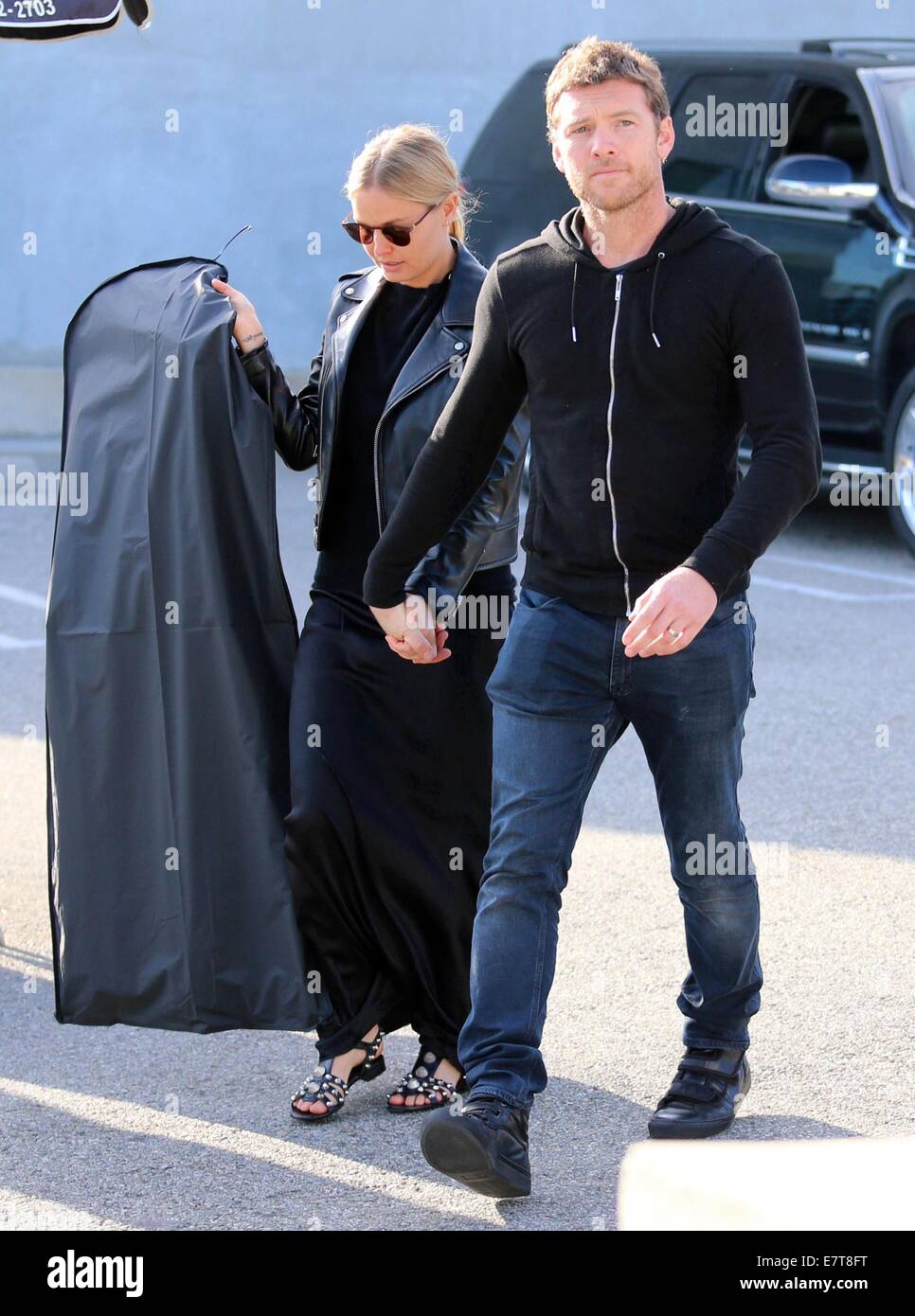 Sam Worthington and his partner, Laura Bingle exit Maxfield after a ...