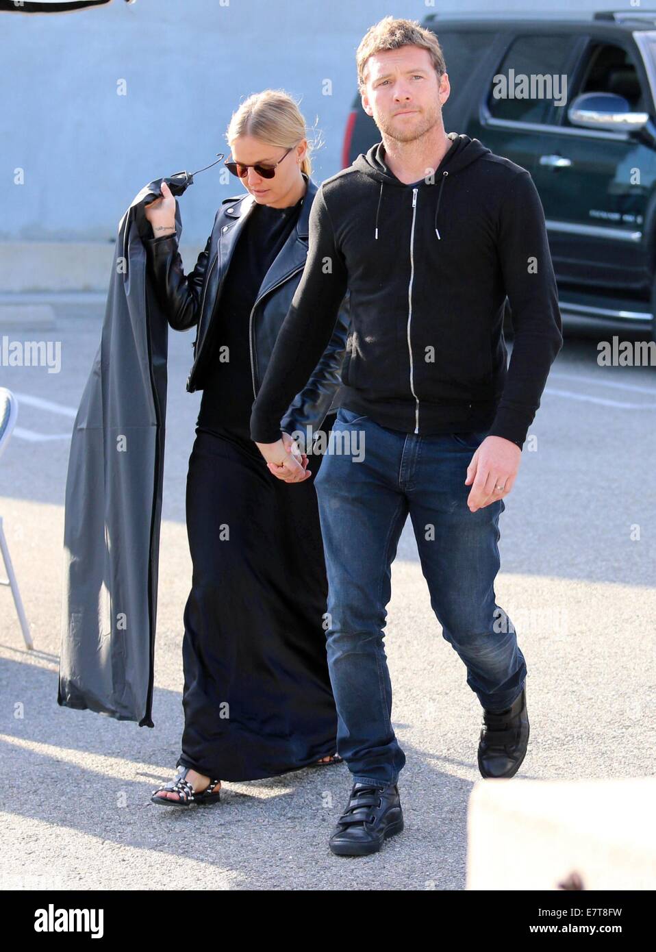 Sam Worthington and his partner, Laura Bingle exit Maxfield after a ...