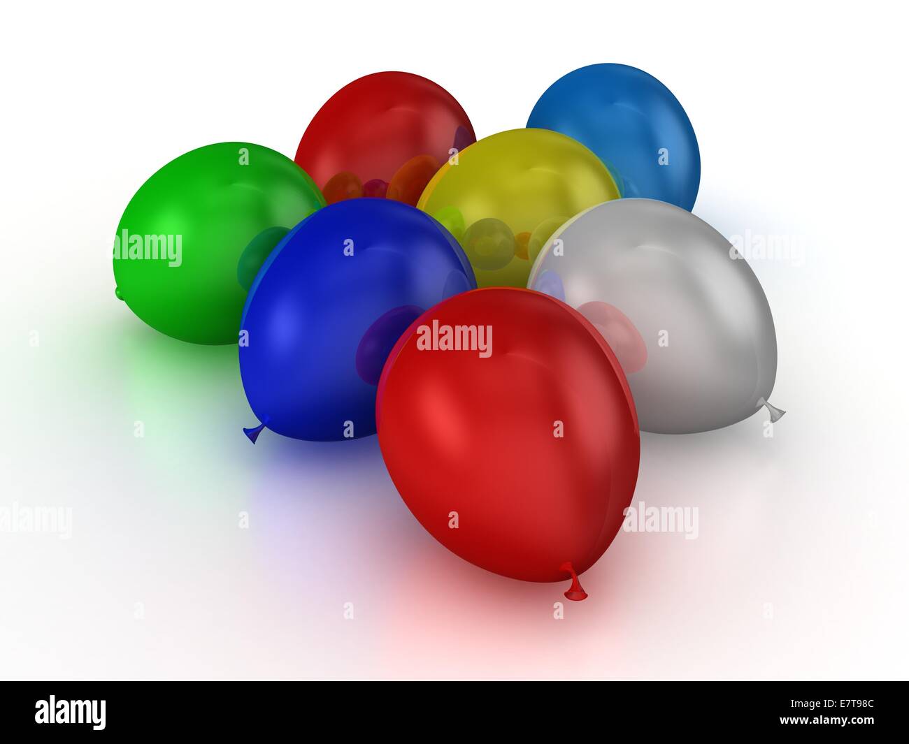 Colorful shiny balloons on ground, isolated on white background Stock ...