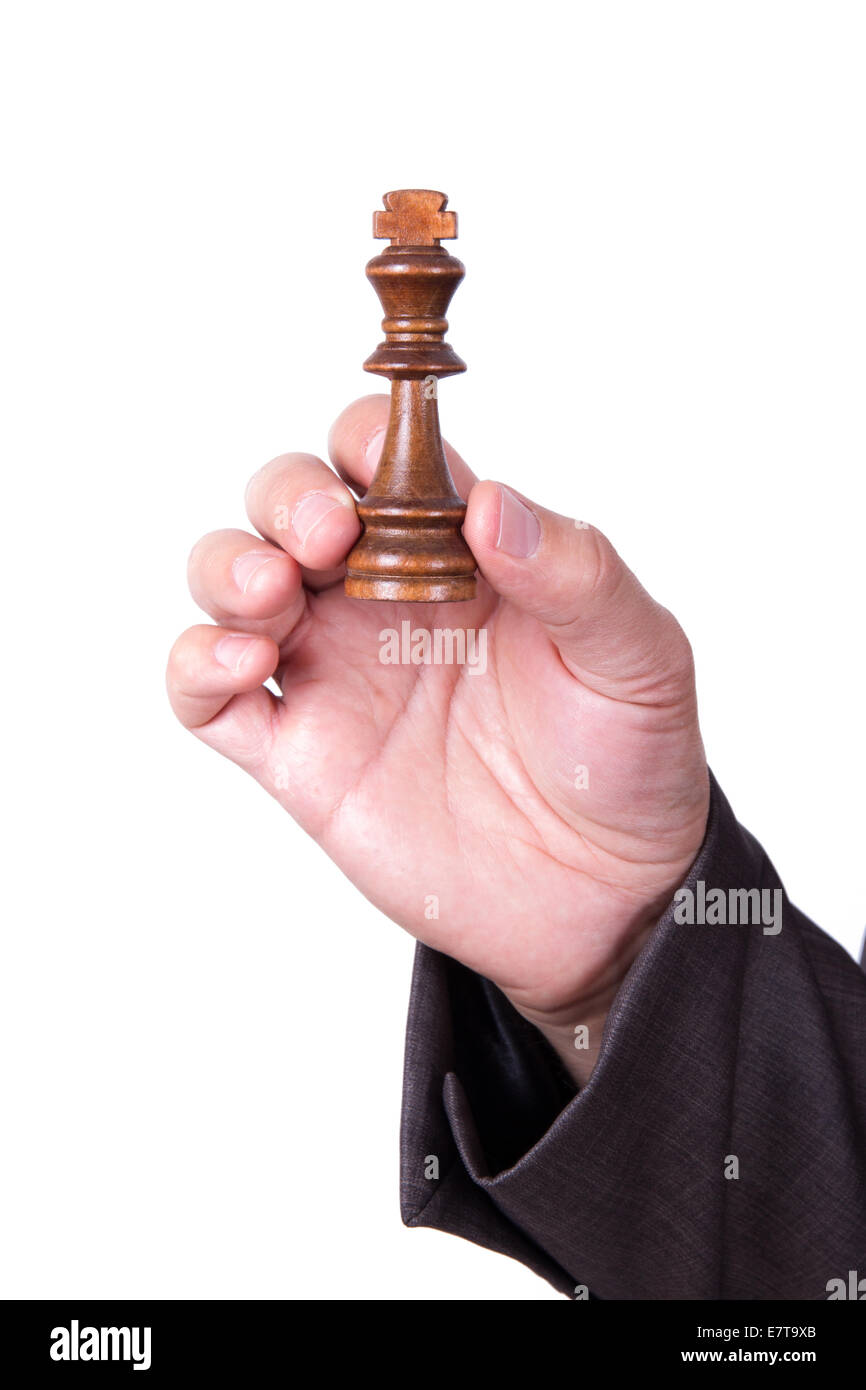 Businessman hand holding and showing chess pieces, king, isolated on ...