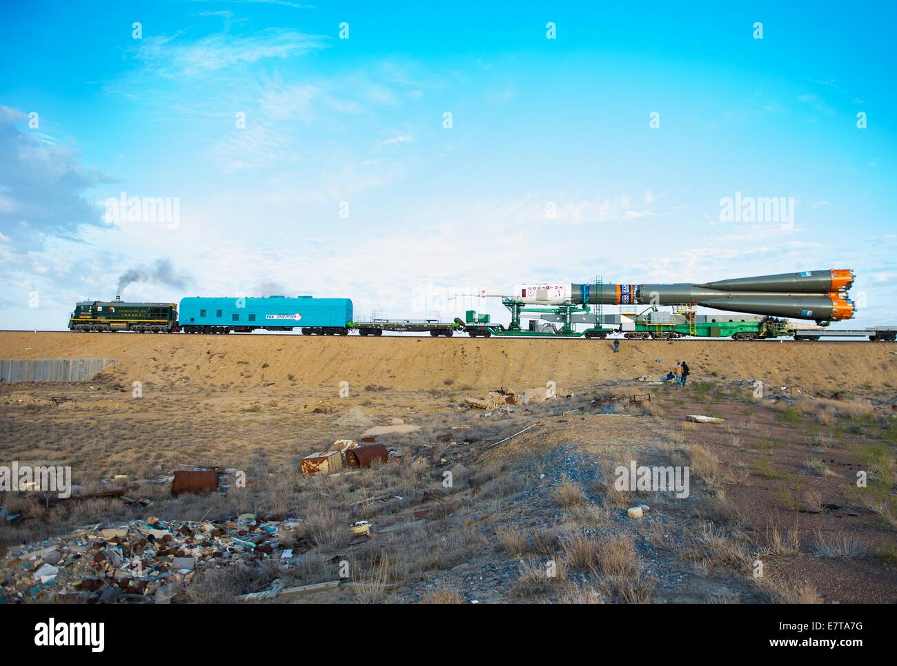 The Soyuz TMA-14M spacecraft rolls out to the launch pad by train at ...
