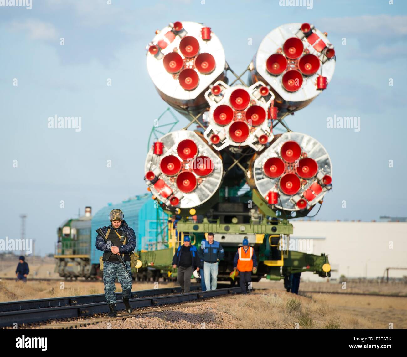 The Soyuz TMA-14M spacecraft rolls out to the launch pad by train at ...