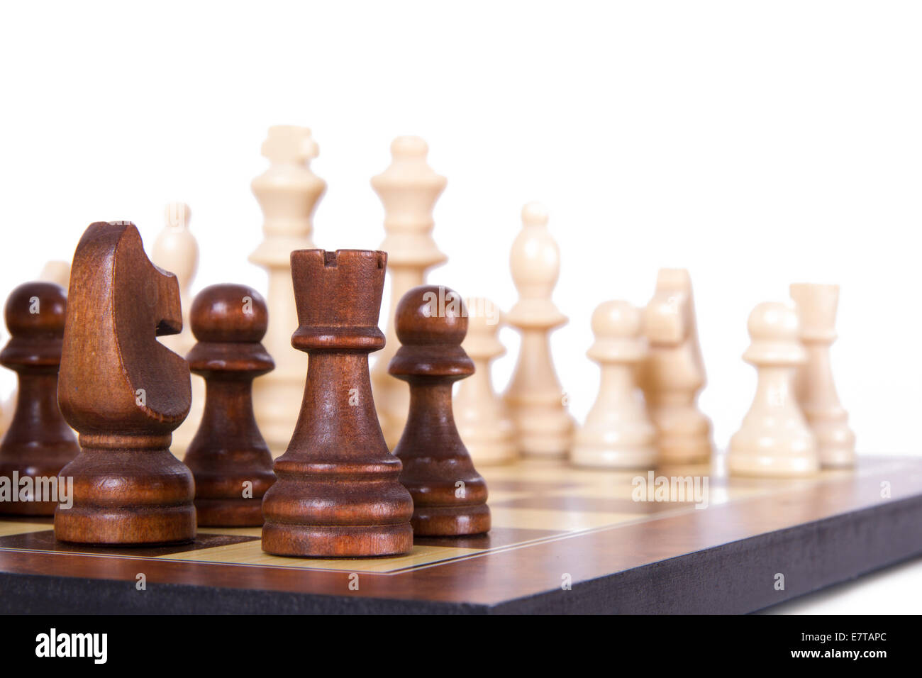 Chess board with starting positions aligned chess pieces, isolated on ...