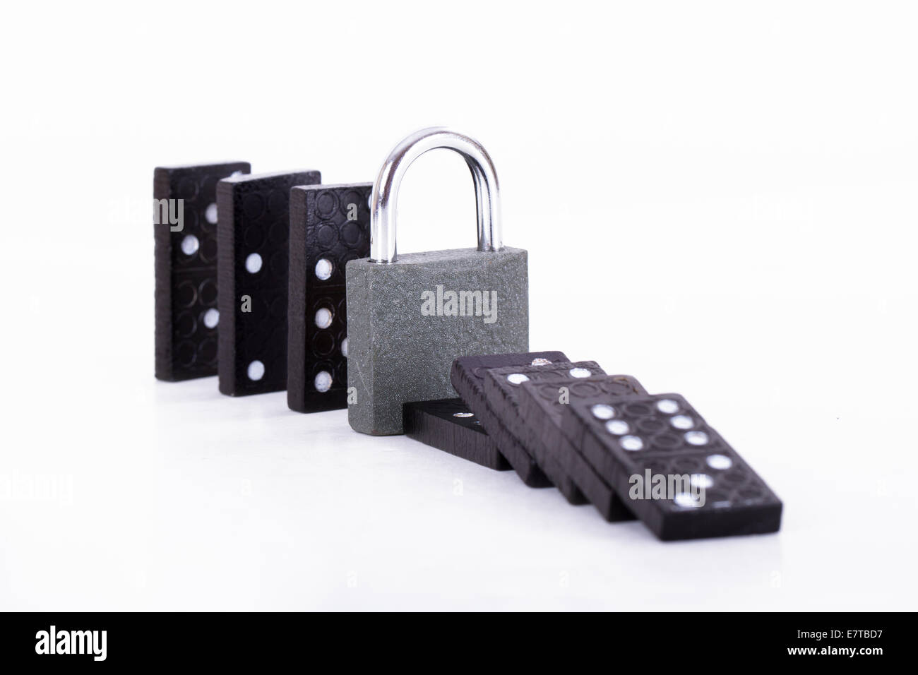 Damage control of black dominoes with padlock for security, isolated on ...