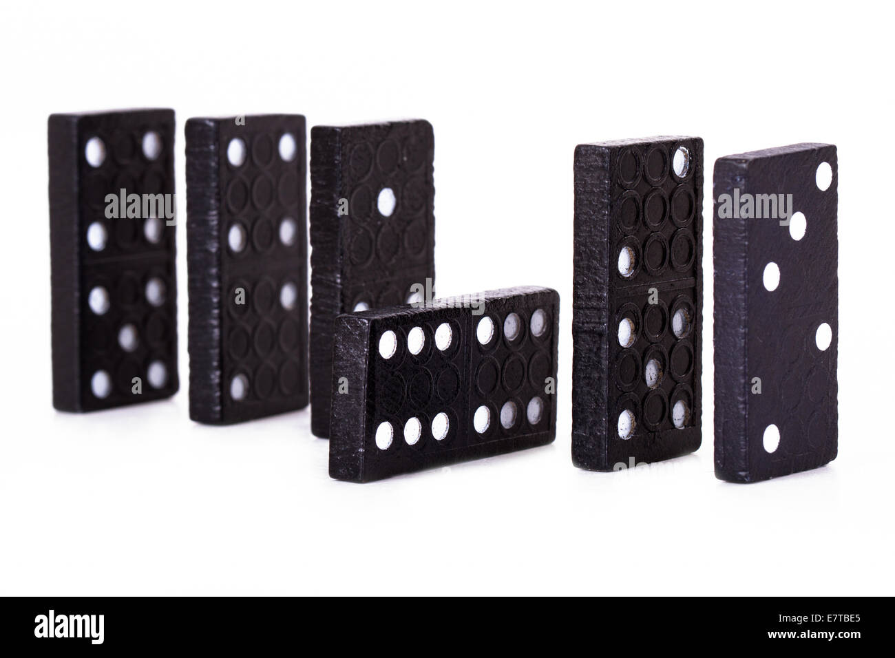 Row of dominoes, isolated on white background Stock Photo - Alamy
