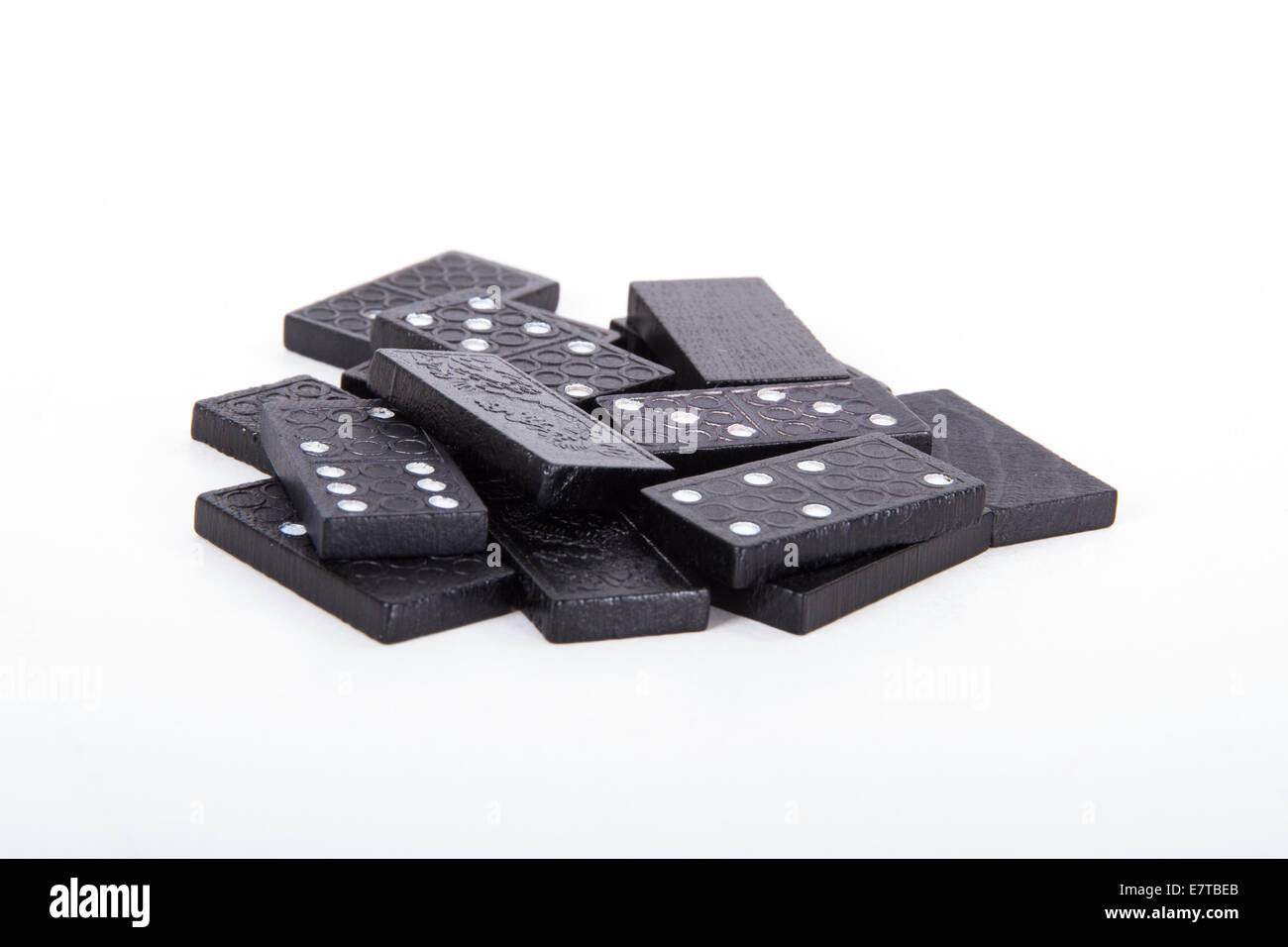 Stack of black dominoes, isolated on white background Stock Photo - Alamy