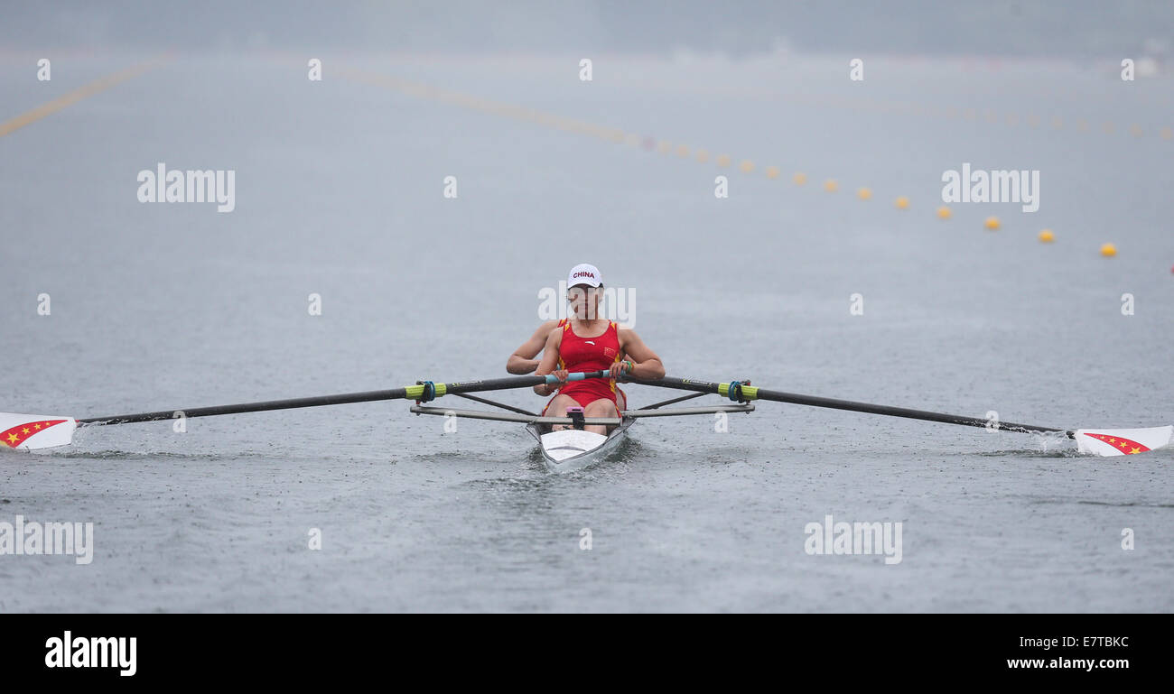 Incheon, South Korea. 24th Sep, 2014. Miao Tian (front) and Zhang Min ...